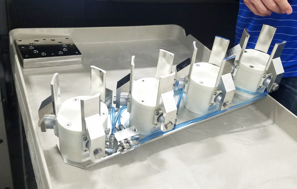 Saving lives: robotic end-of-arm-tooling picks and places frozen ...